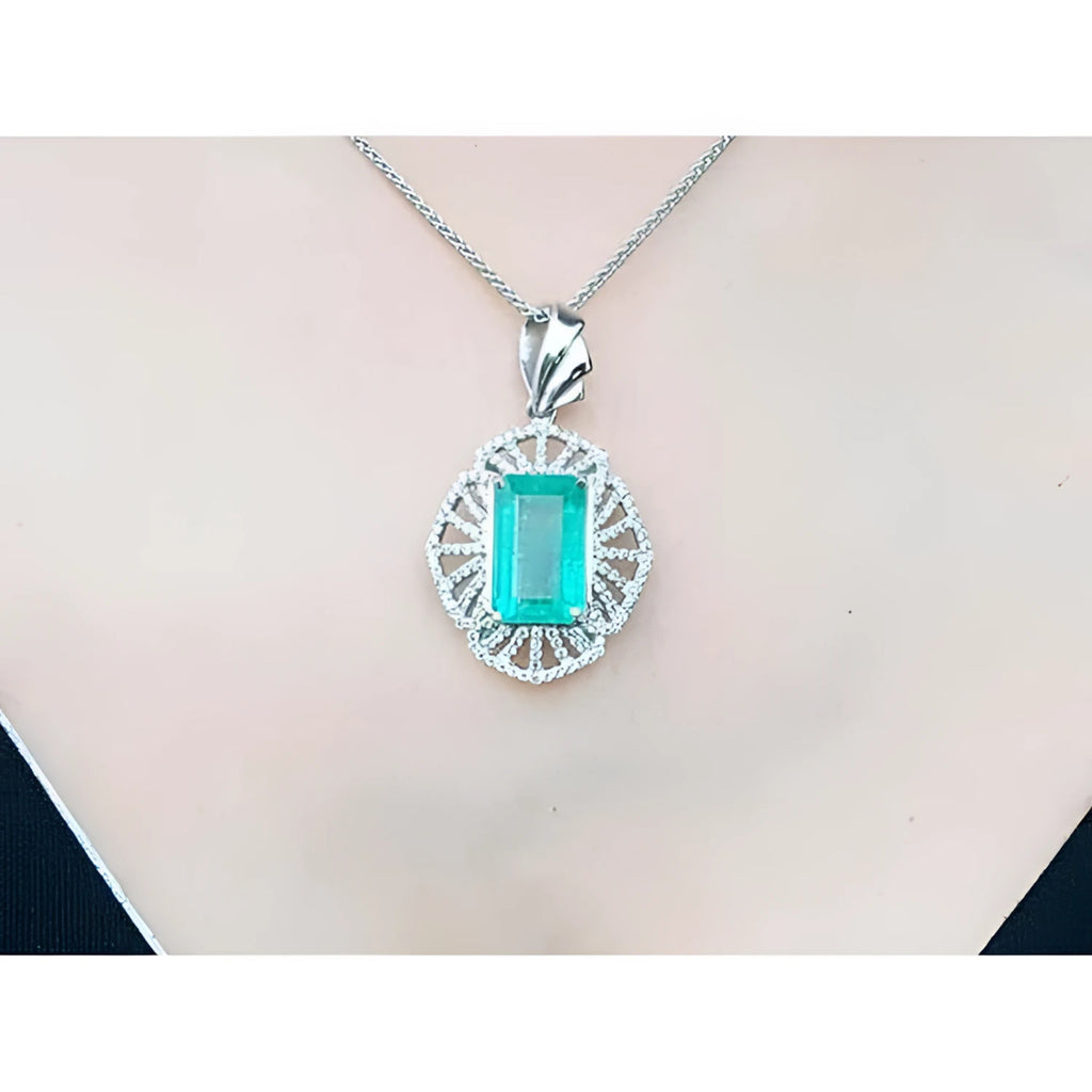 6.19 ct. Emerald-cut Emerald Pendant 14K White Gold